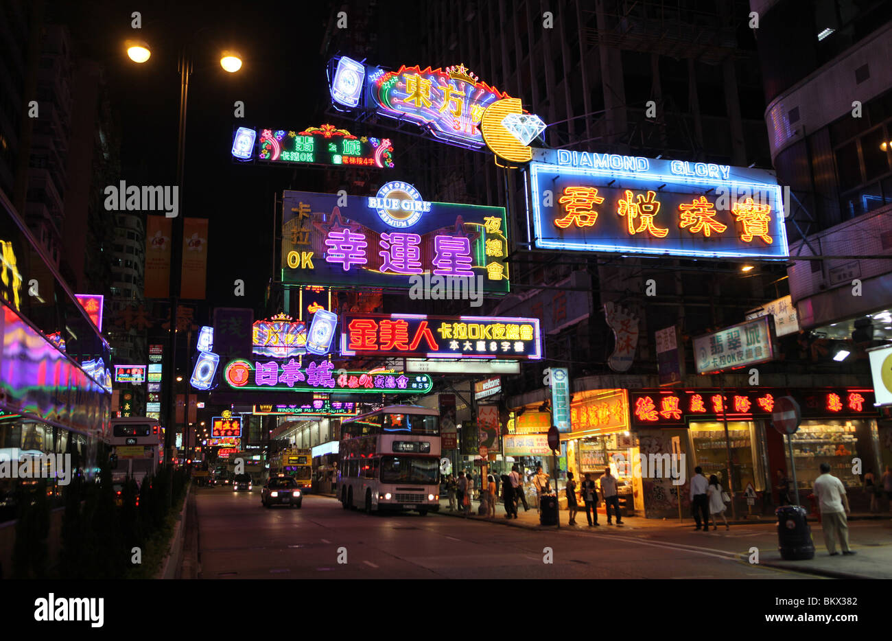 A street lit up with neon signs in Kowloon in Hong Kong, China Stock ...