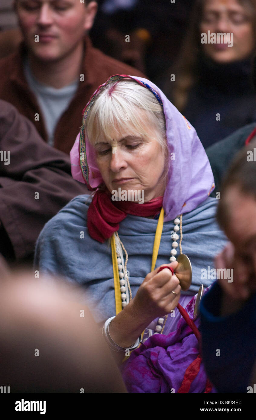 Visiting protesters chanting and praying outside the stall of sacred ...