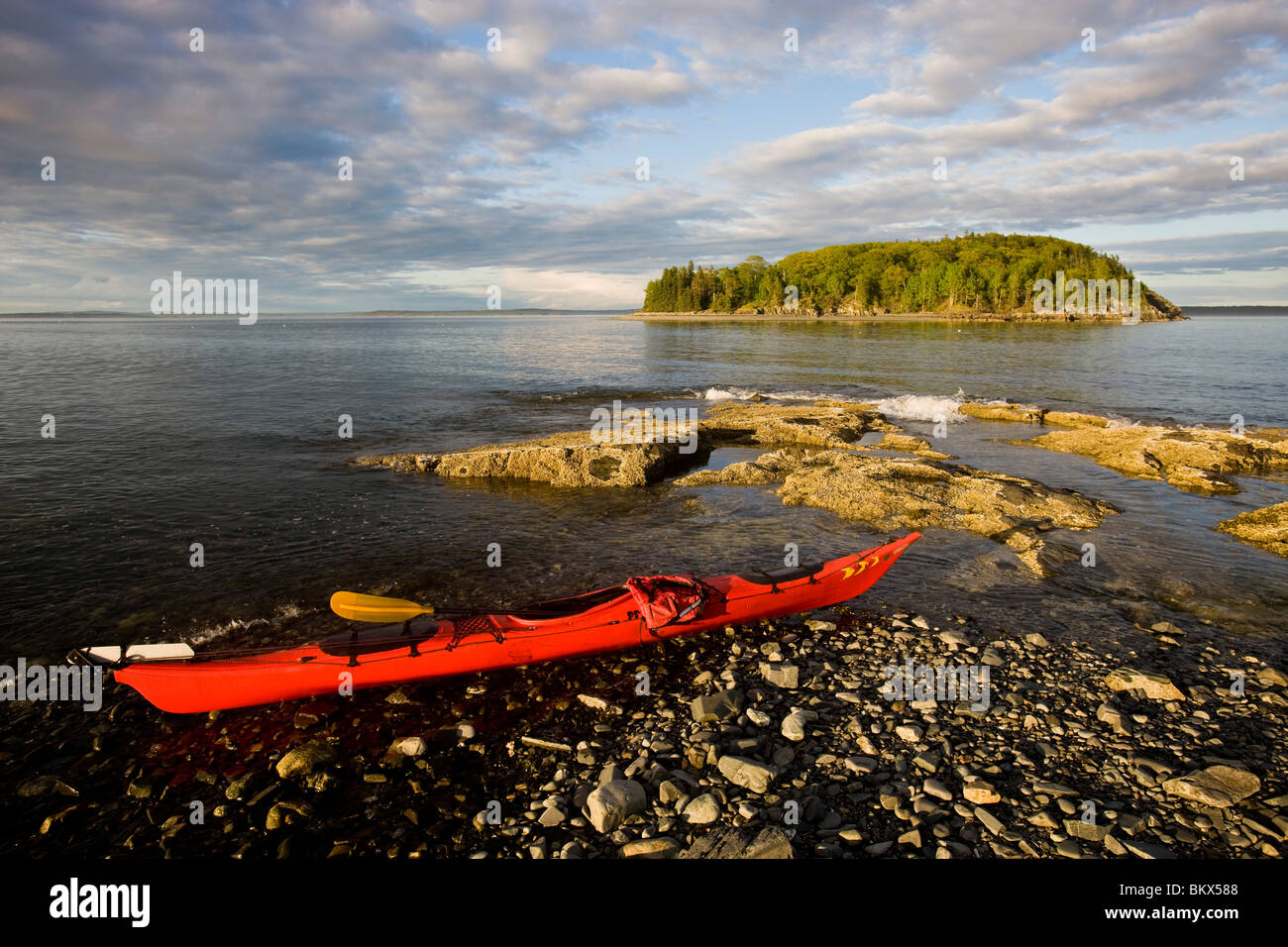 A kayak in the Porcupine Islands in Maine's Acadia National Park. Bar ...