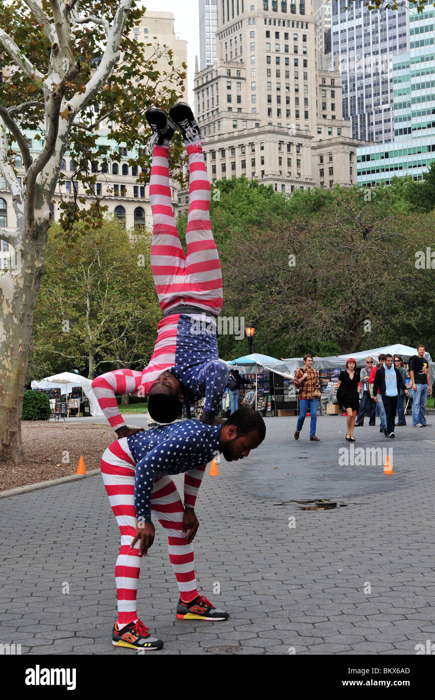 street performance circus acrobats black men man U.S.A N.Y New York ...
