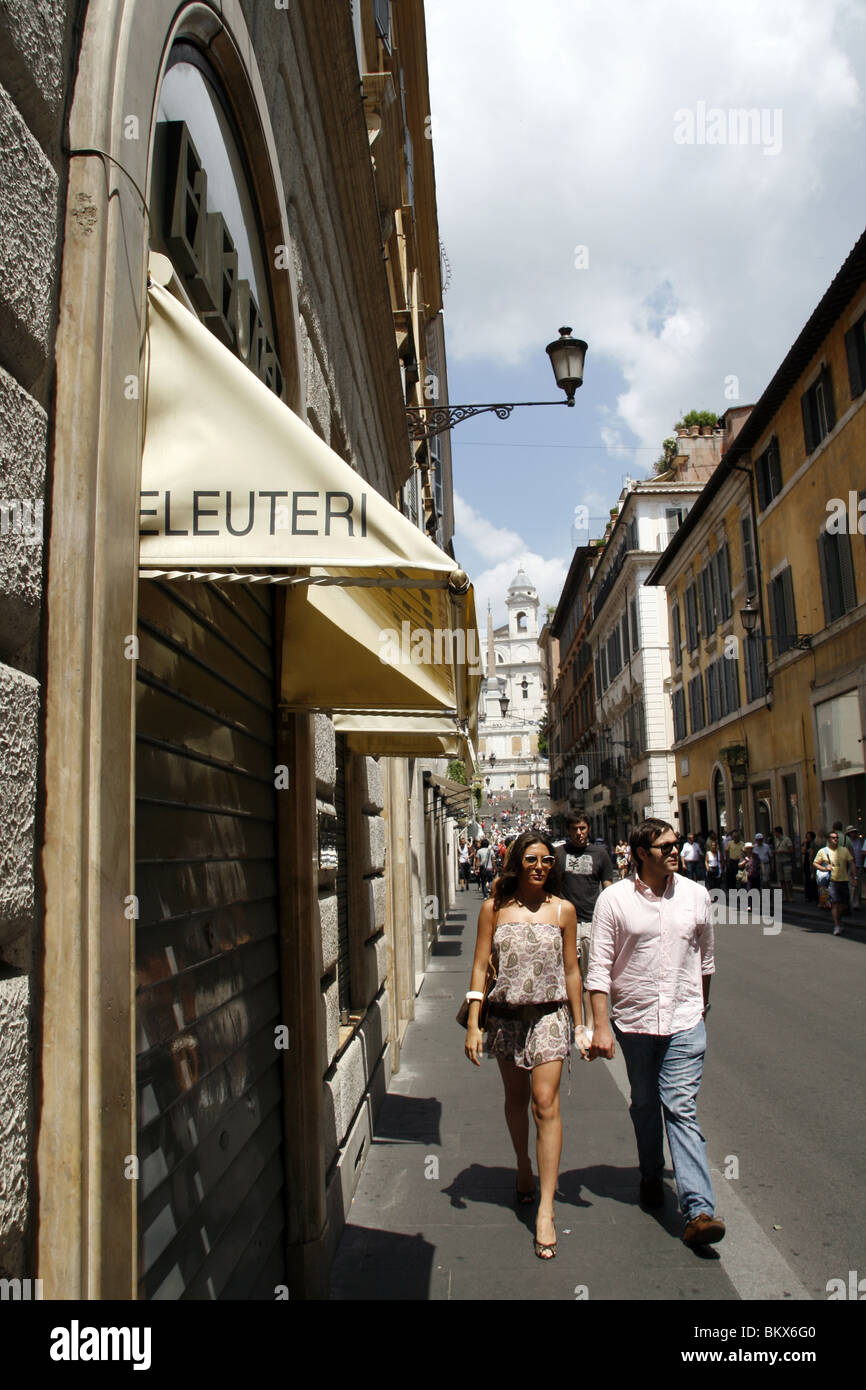 couple walking on via condotti street in rome Stock Photo - Alamy