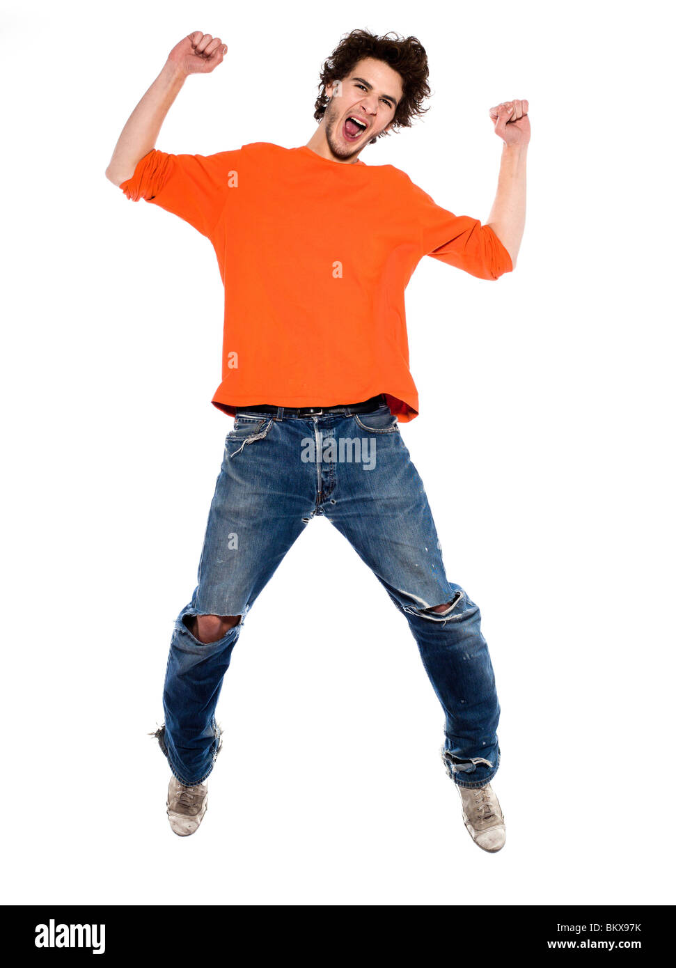 one expressive caucasian young man screaming happy joy full length in ...