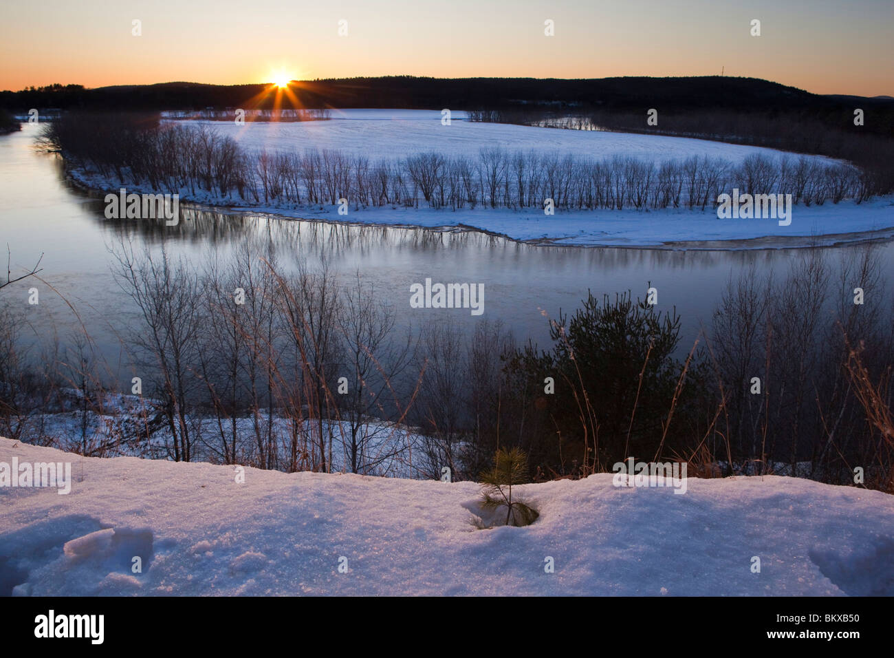 Sunset as seen from a bluff overlooking the Merrimack River in ...