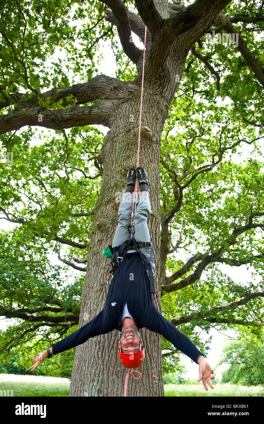 Man hanging upside down by a rope hi-res stock photography and images ...