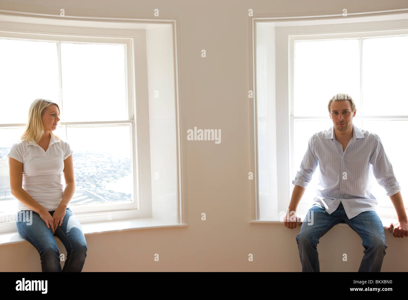 People Sitting In Window Sills High Resolution Stock Photography and ...