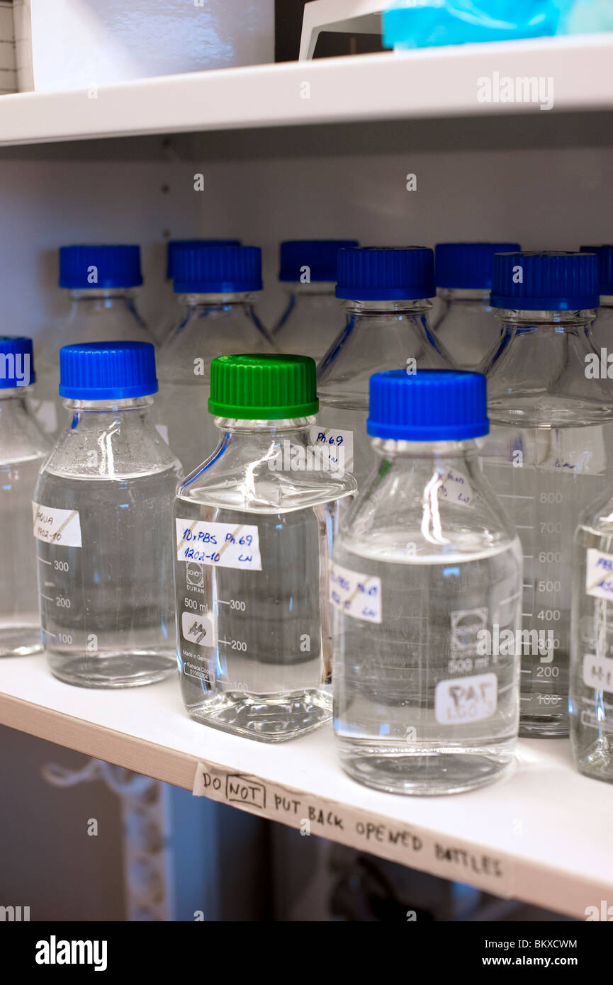 Heat-proof pyrex glass bottles with a colorless transparent liquid ...