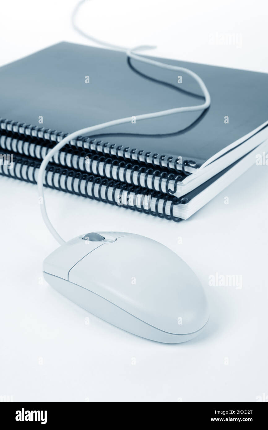 school textbook and computer mouse, online learning Stock Photo - Alamy