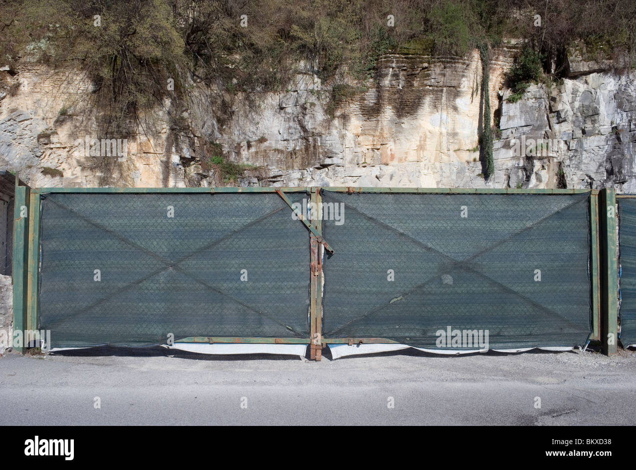 gate under mountain wall Stock Photo - Alamy