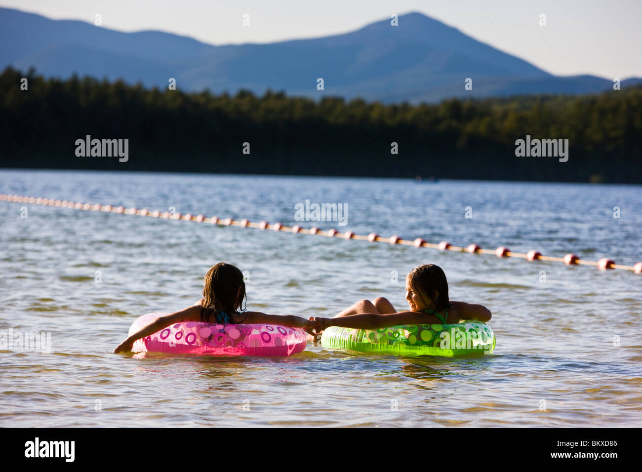 Girls female kids children float hi-res stock photography and images ...