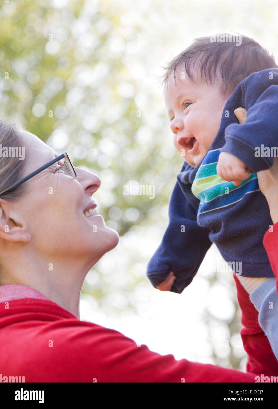 Lifting up babies hi-res stock photography and images - Alamy