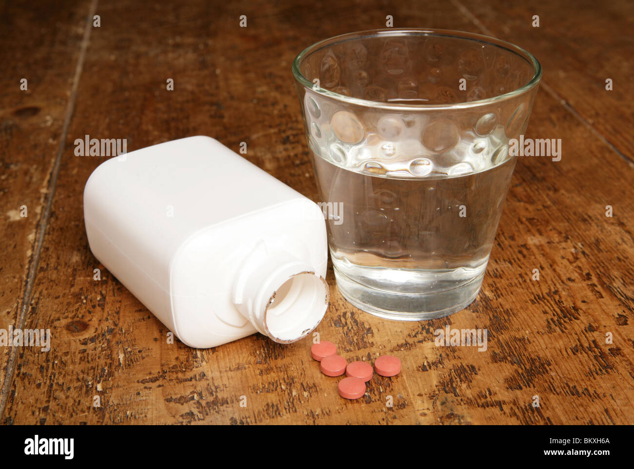 Glass of water with vitamin studio portrait Stock Photo - Alamy