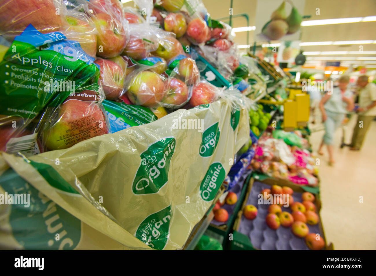 Organic apples for sale on supermarket shelves UK Stock Photo - Alamy
