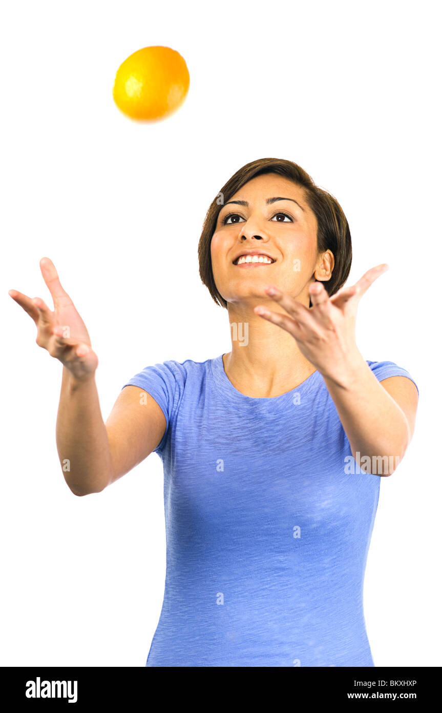 Food fruit fresh toss throw orange hi-res stock photography and images ...