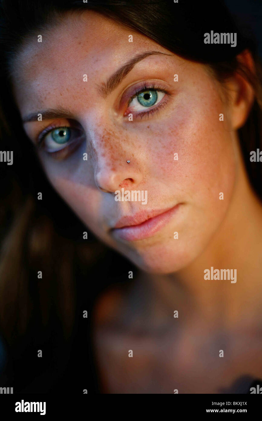 Pretty woman with green eyes, intimate head shot of face Stock Photo ...
