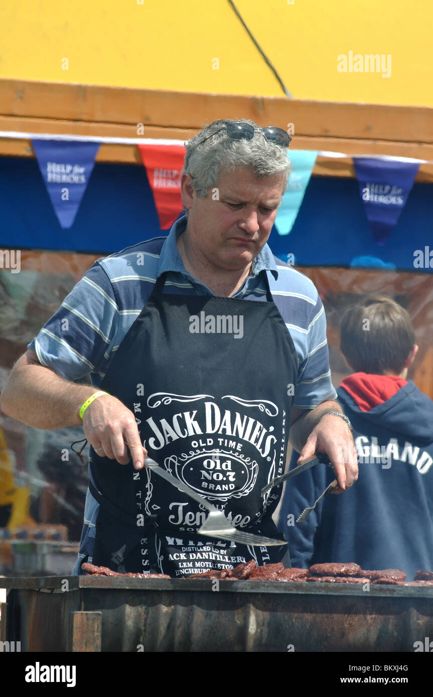 Barbecueing hi-res stock photography and images - Alamy