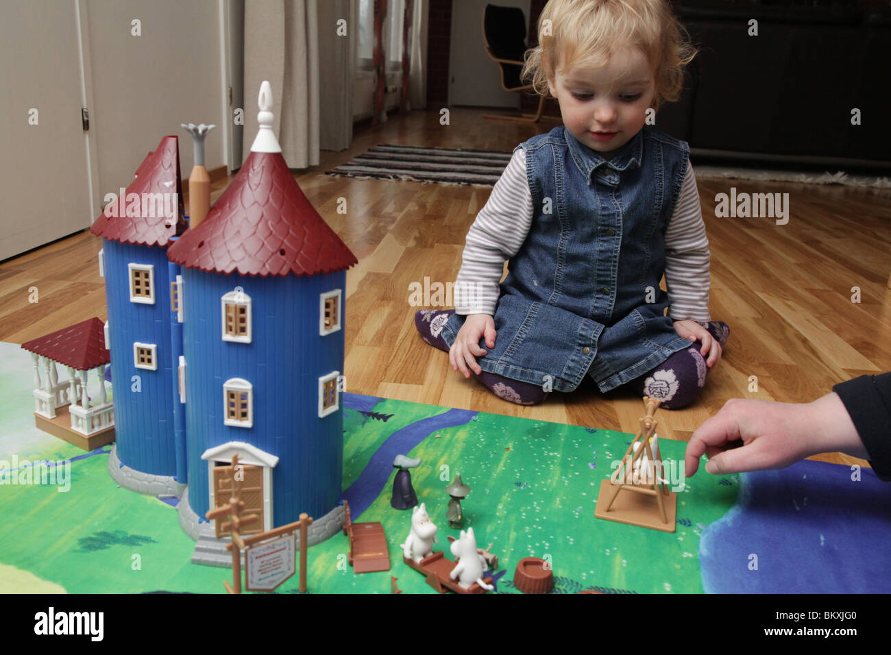 NORDIC TODDLER WITh MOOMIN CASTLE: A two year old baby girl toddler ...