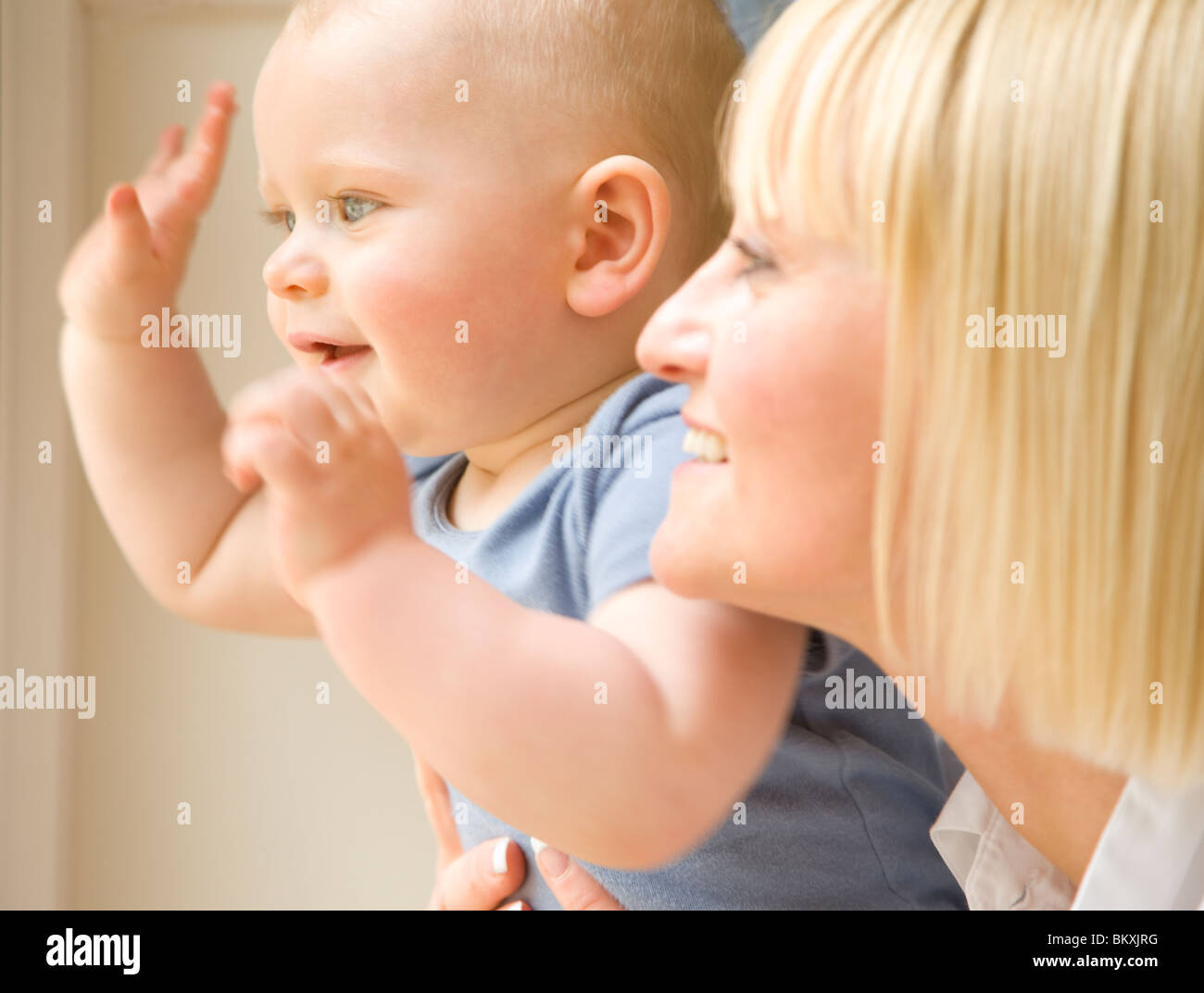 Baby waving his arms hi-res stock photography and images - Alamy