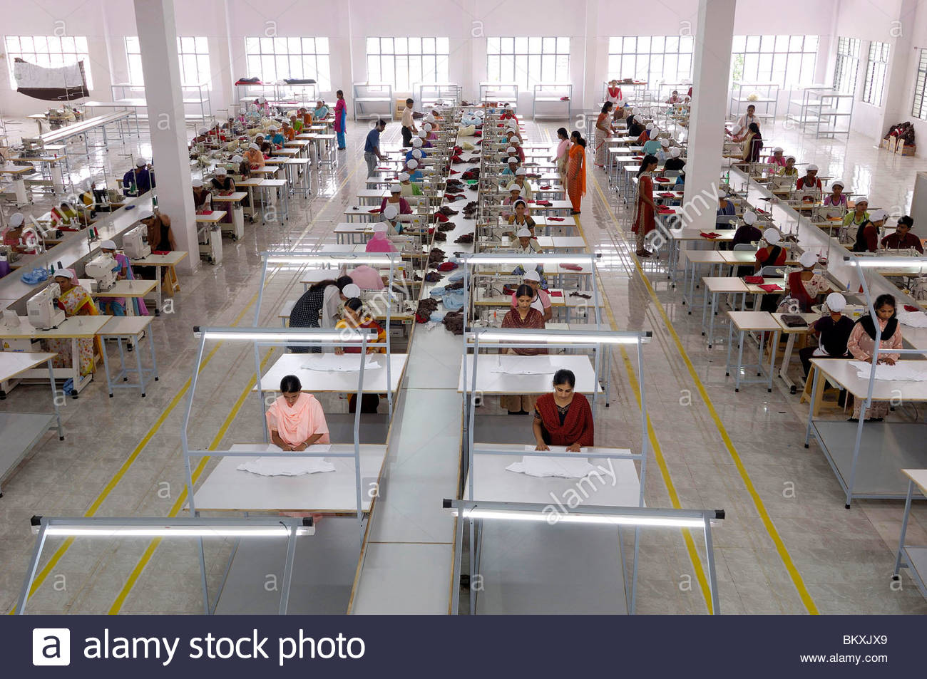 Readymade Garment Factory Interior People Working On Sewing Machine