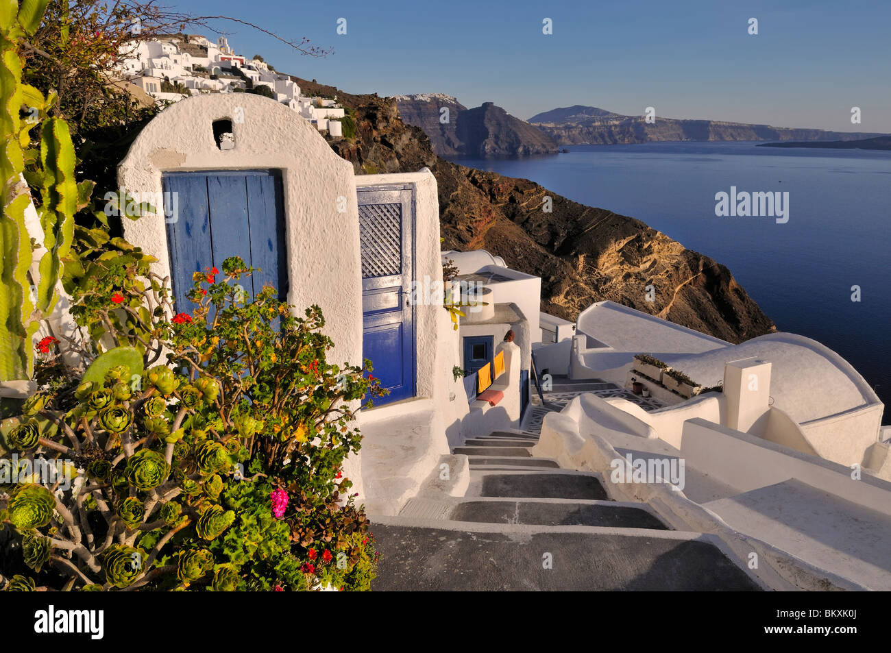 A walkway and stairs leading to a typical cliff dwelling on the caldera ...