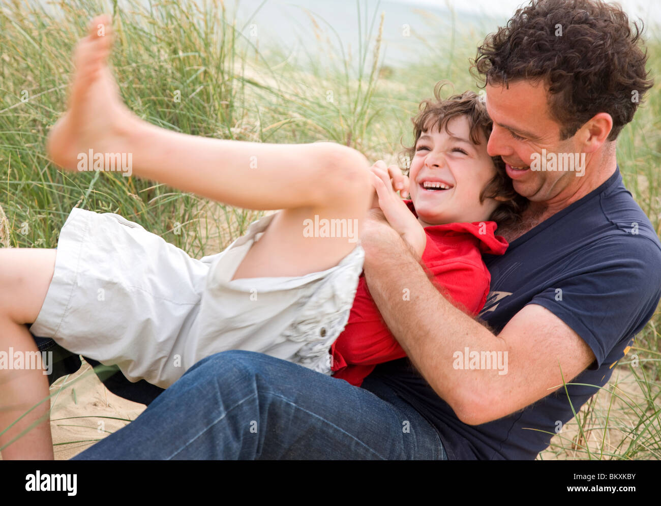 Adults fighting child hi-res stock photography and images - Alamy