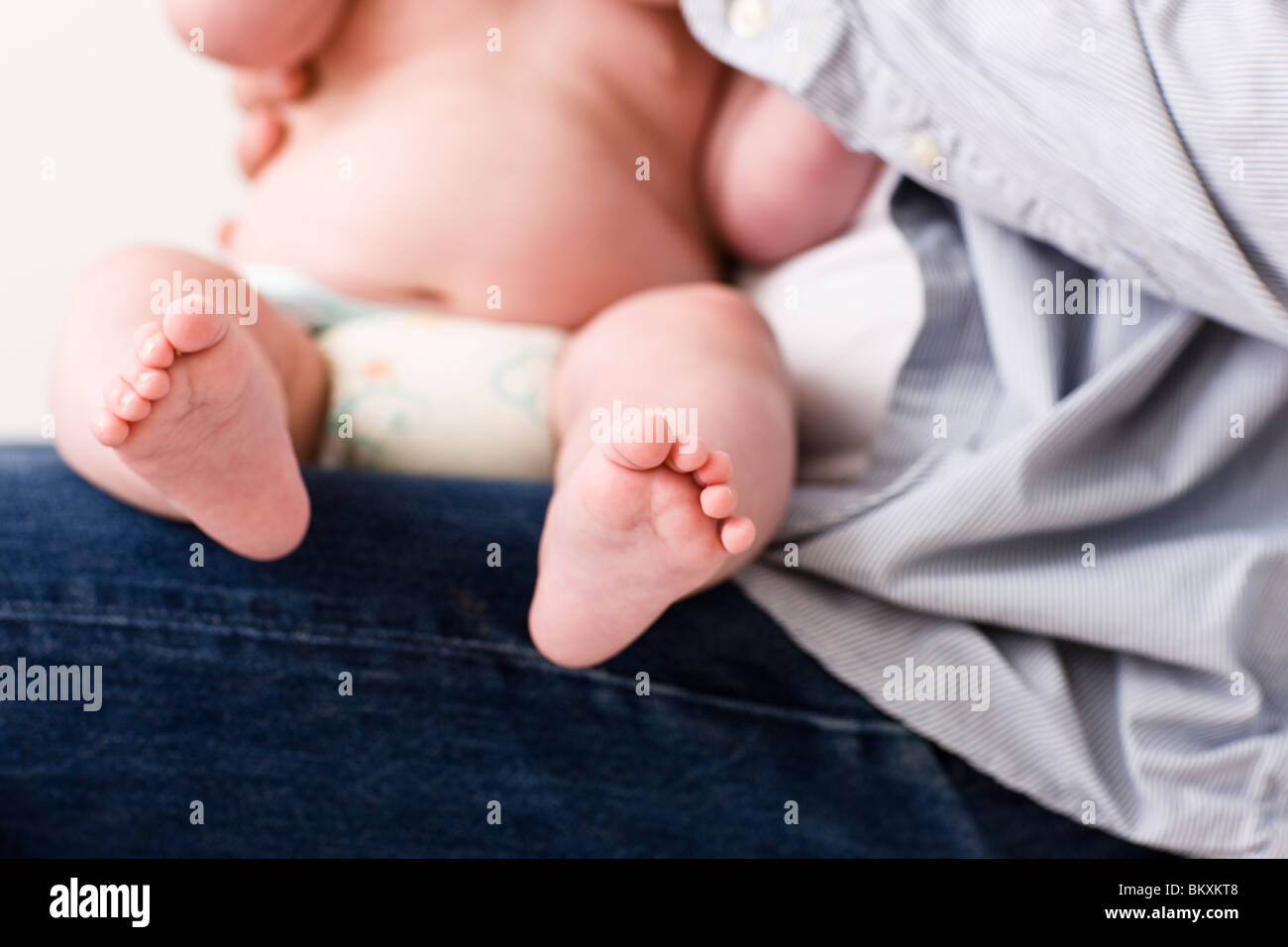 Baby boy nappy legs hi-res stock photography and images - Alamy
