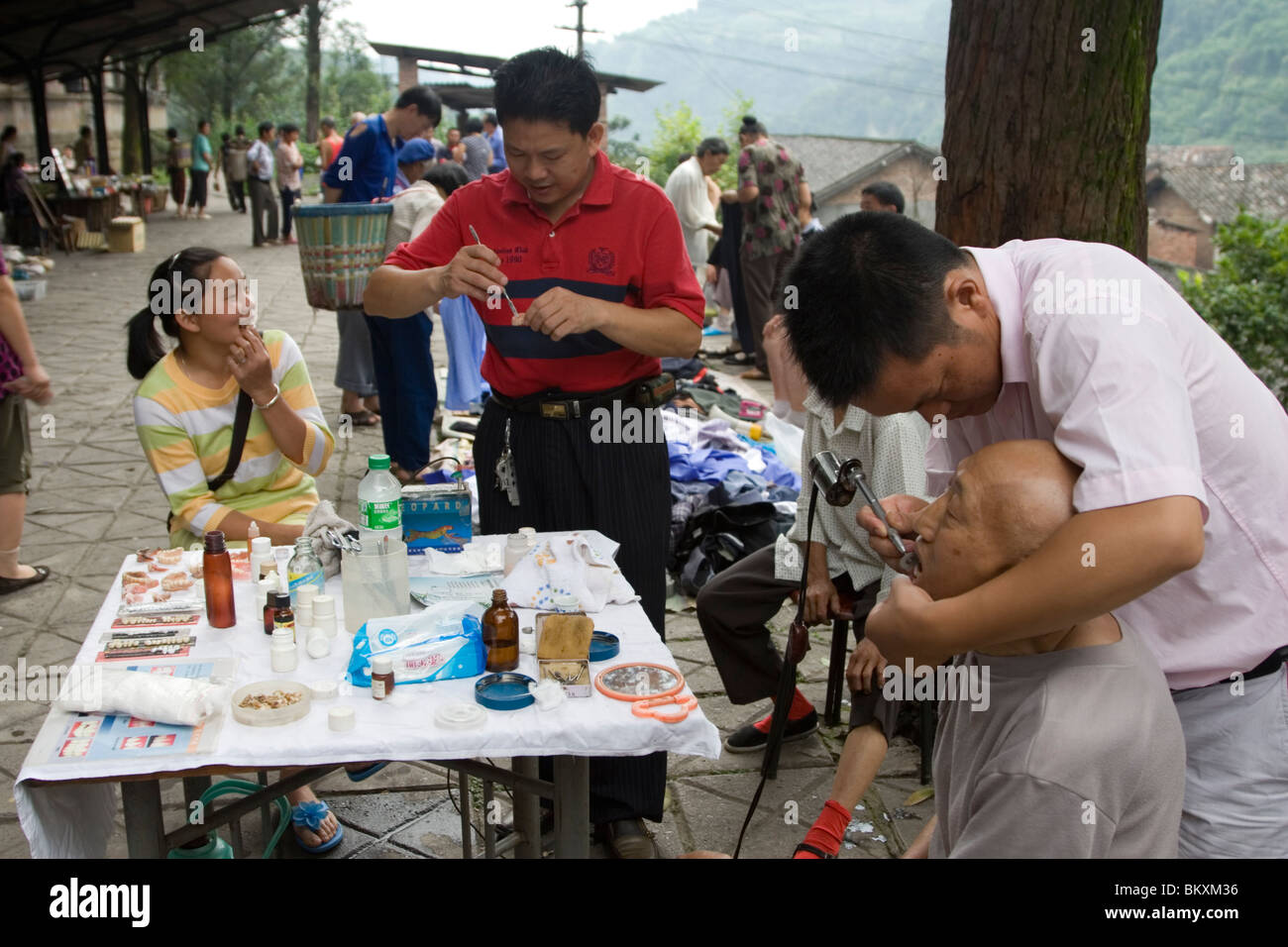 An dentist's makeshift stall in the town centre of old and poor former ...