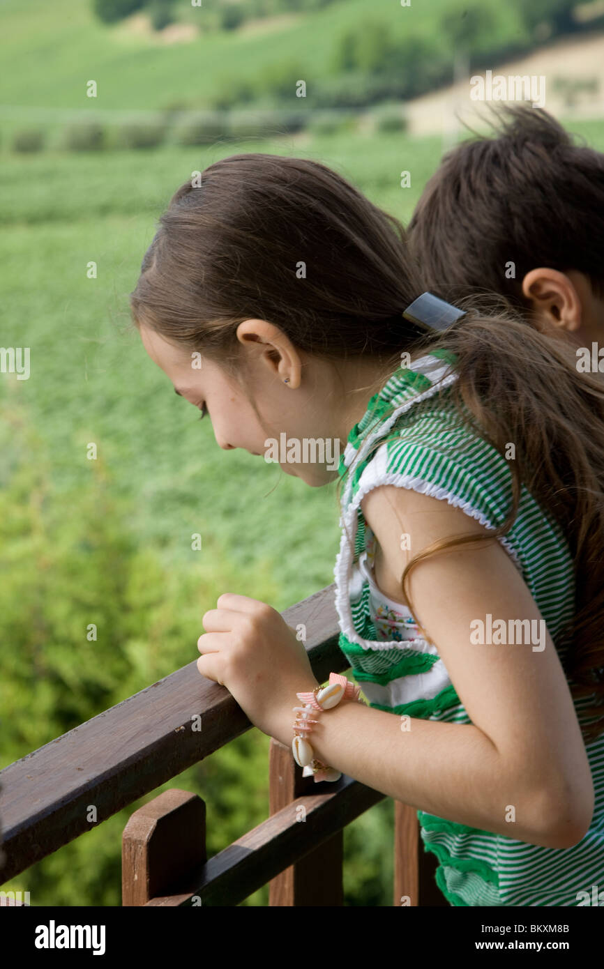 Leaning Over Balcony High Resolution Stock Photography and Images - Alamy