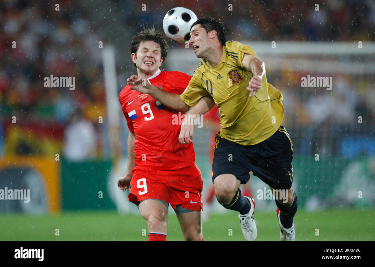Ivan Saenko of Russia (L) and Joan Capdevila of Spain (R) vie for a ...