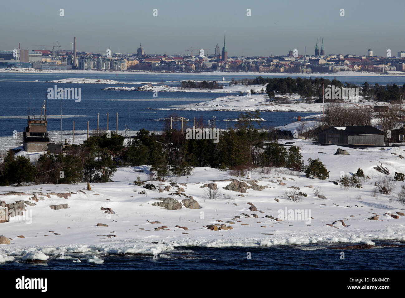 HELSINKI SKYLINE FROM SEA WINTER: Helsinki skyline over islands outside ...