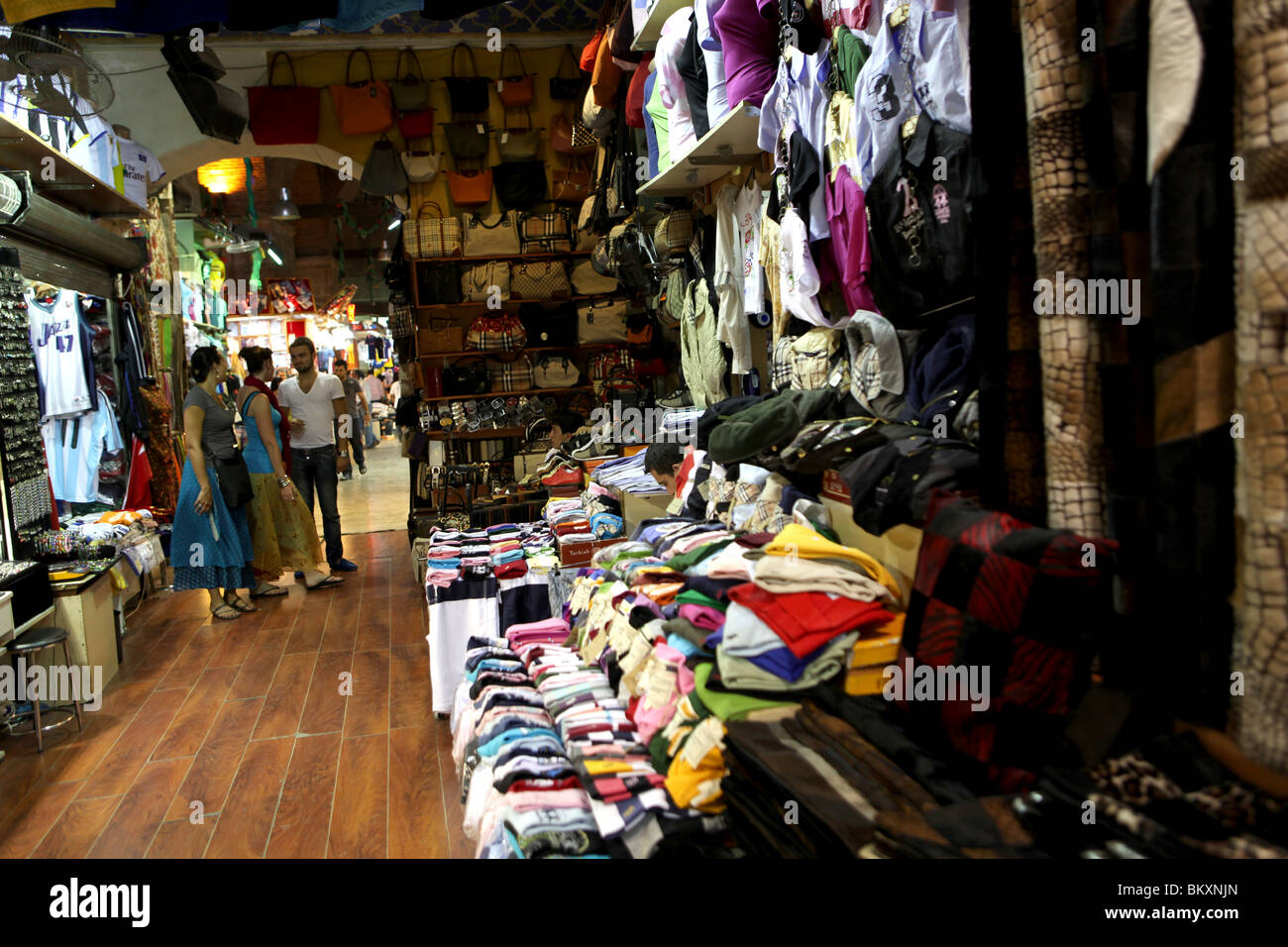 Souvenirs, clothes and bags on display in the Grand Bazaar in central ...