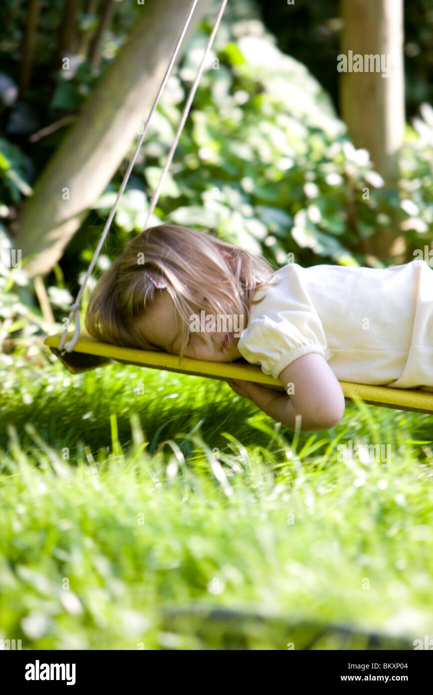 Girl lying swing sleeping High Resolution Stock Photography and Images ...
