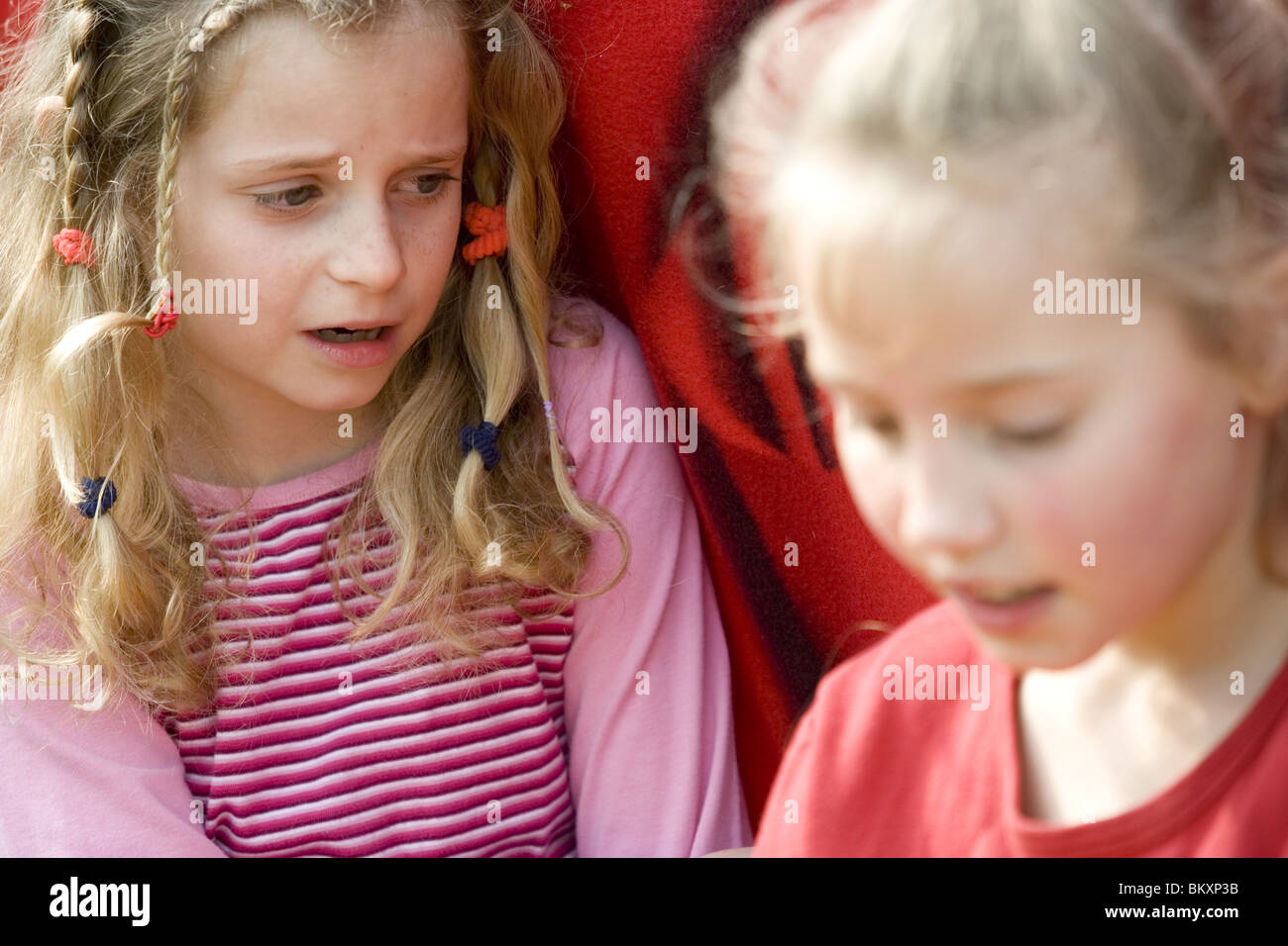 Children gossip or child turning down a friend Stock Photo - Alamy