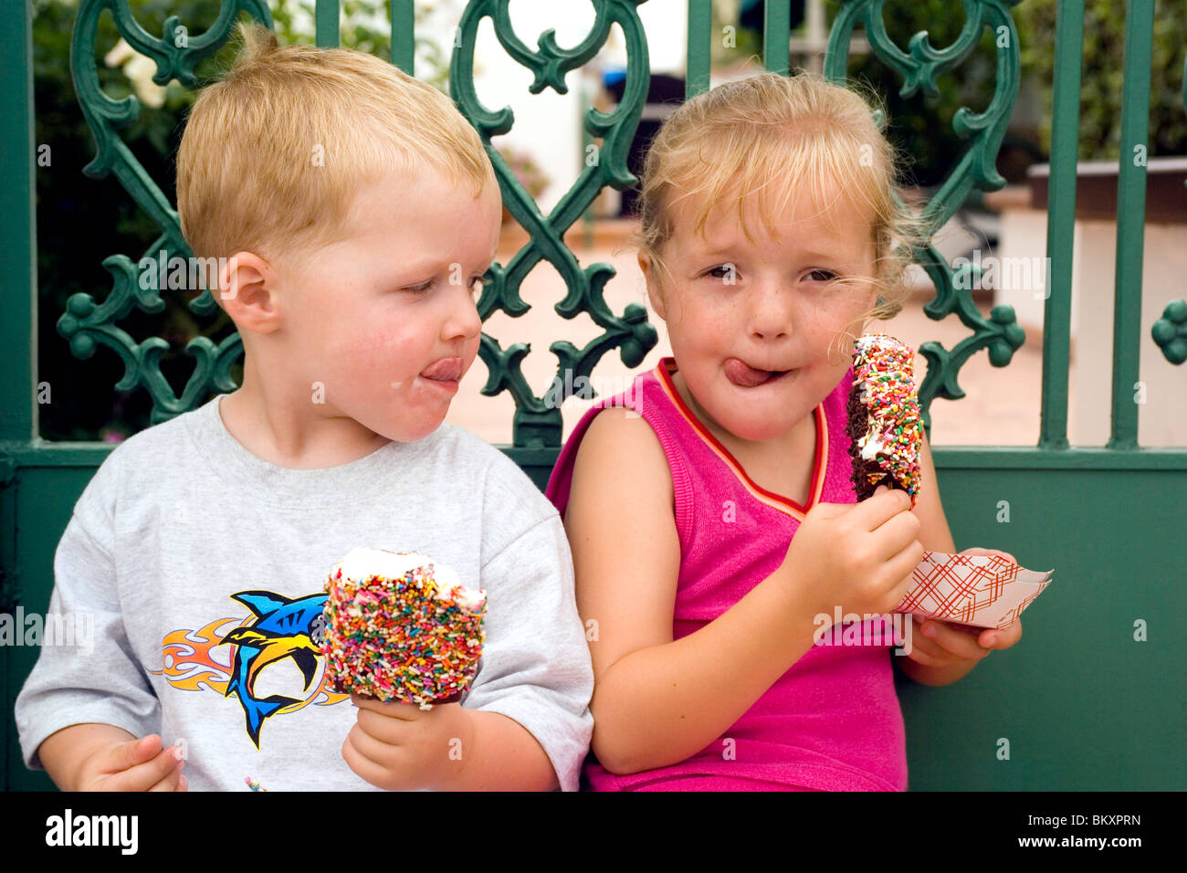 A young brother and sister enjoy Balboa Bars, a traditional and tasty ...
