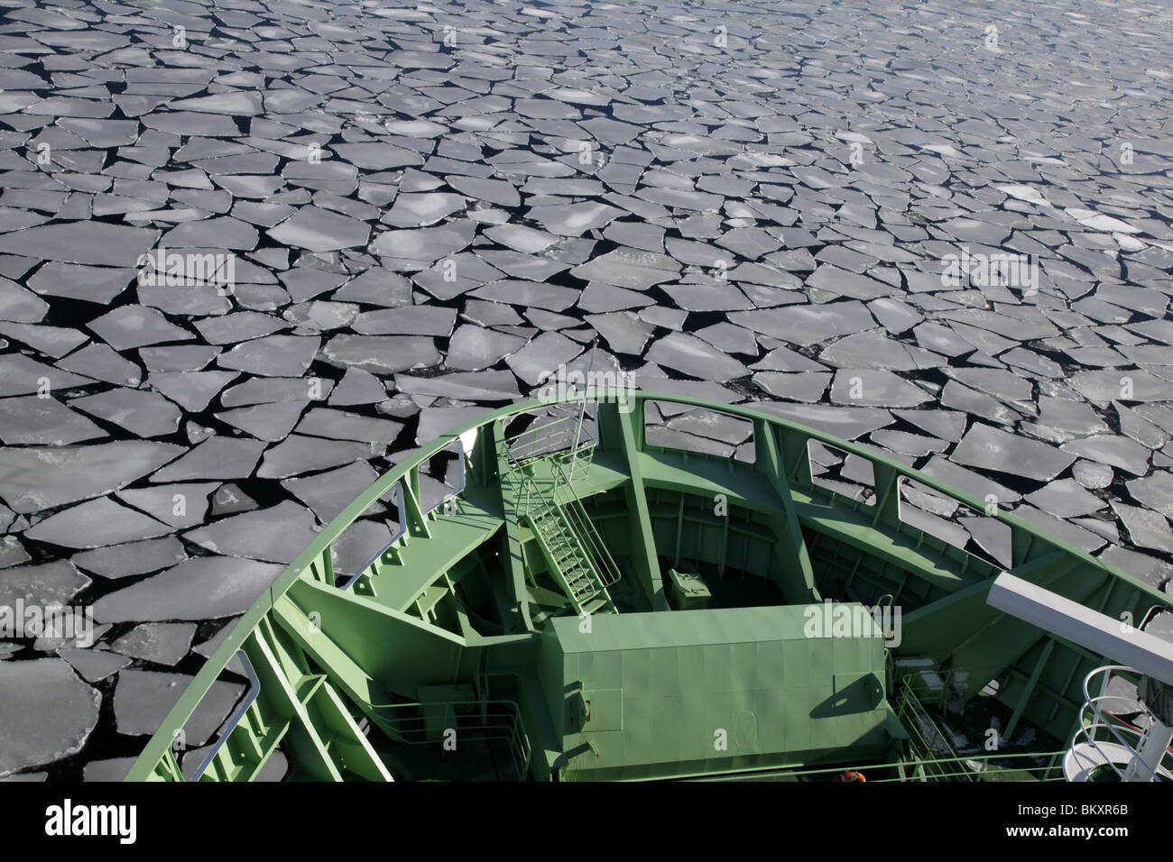 FERRY BOW DRAMATIC CROSSING SEA ICE BELT: Ferry boat ship cuts through ...