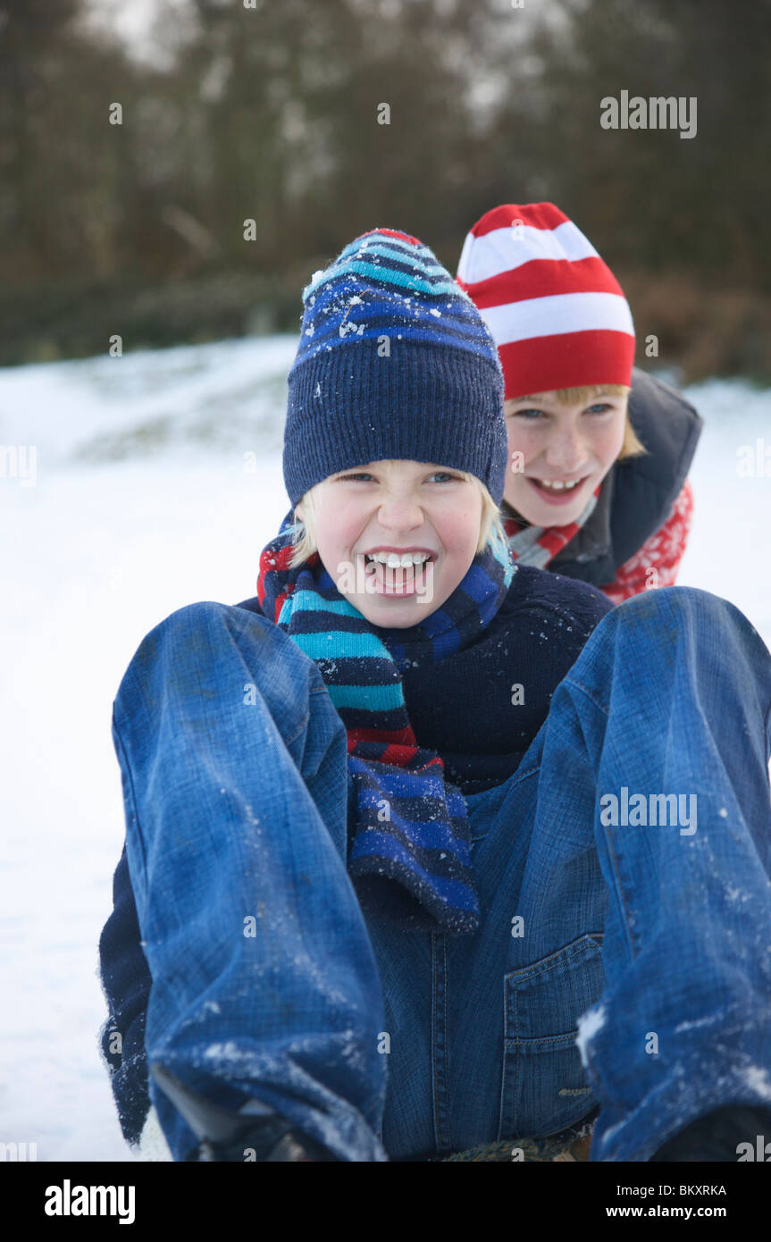 Close up boy pushing friend hi-res stock photography and images - Alamy
