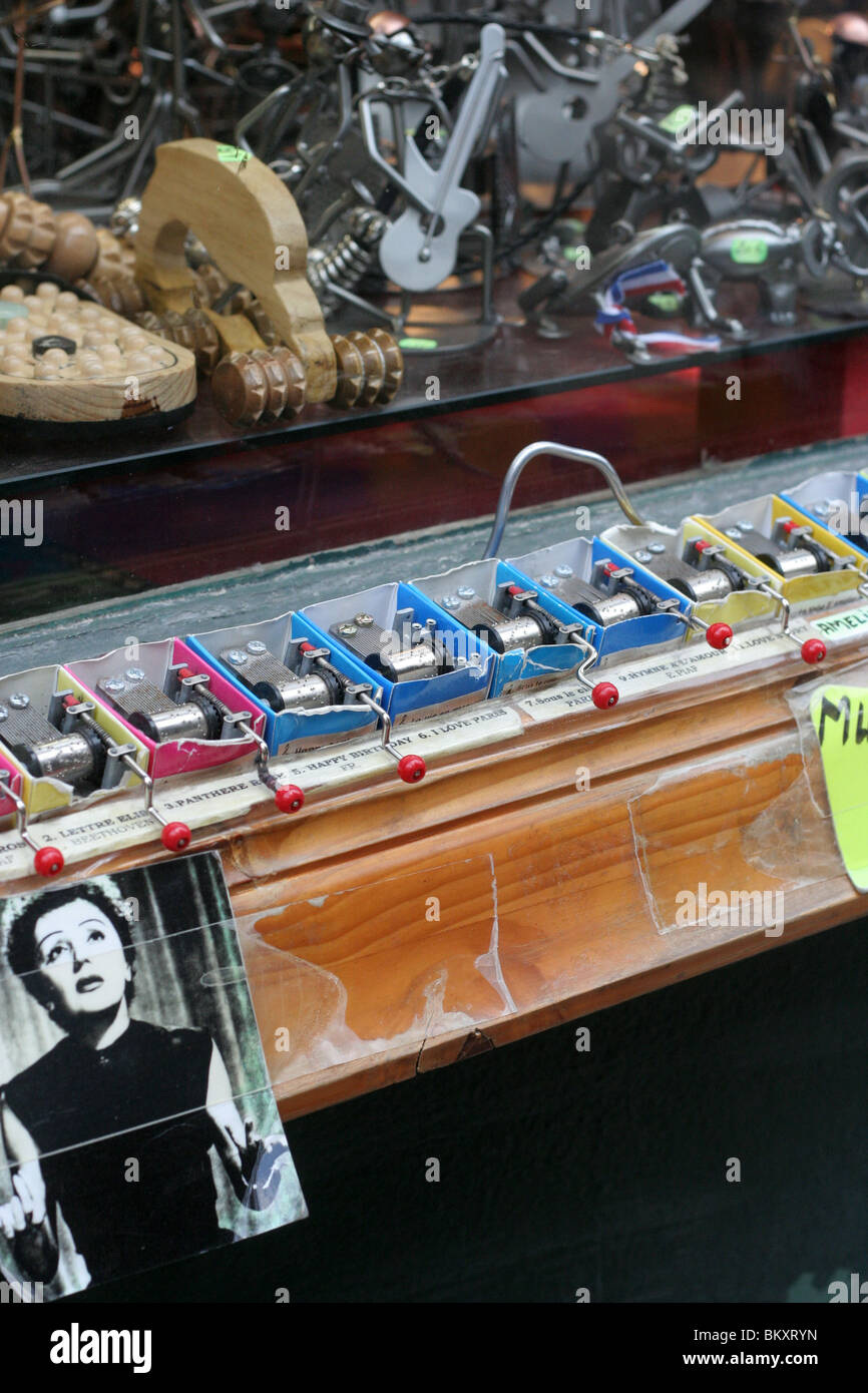 Music boxes and portrait of Edith Piaf in Montmartre. Paris, France ...