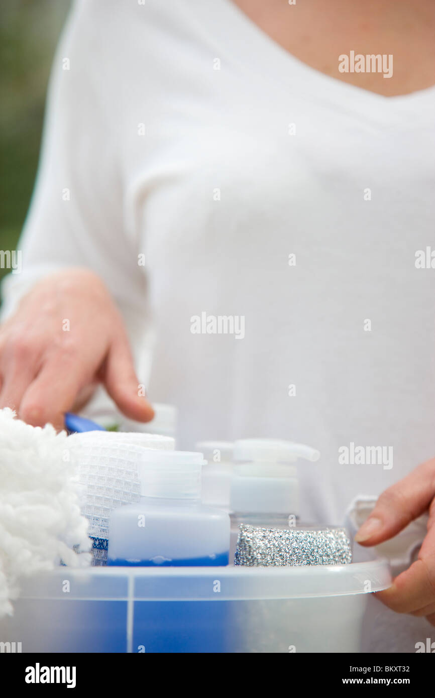 Woman holding detergent box hi-res stock photography and images - Alamy