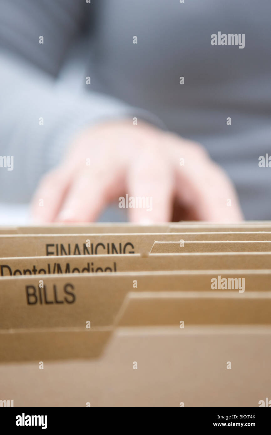 Flicking paper hi-res stock photography and images - Alamy