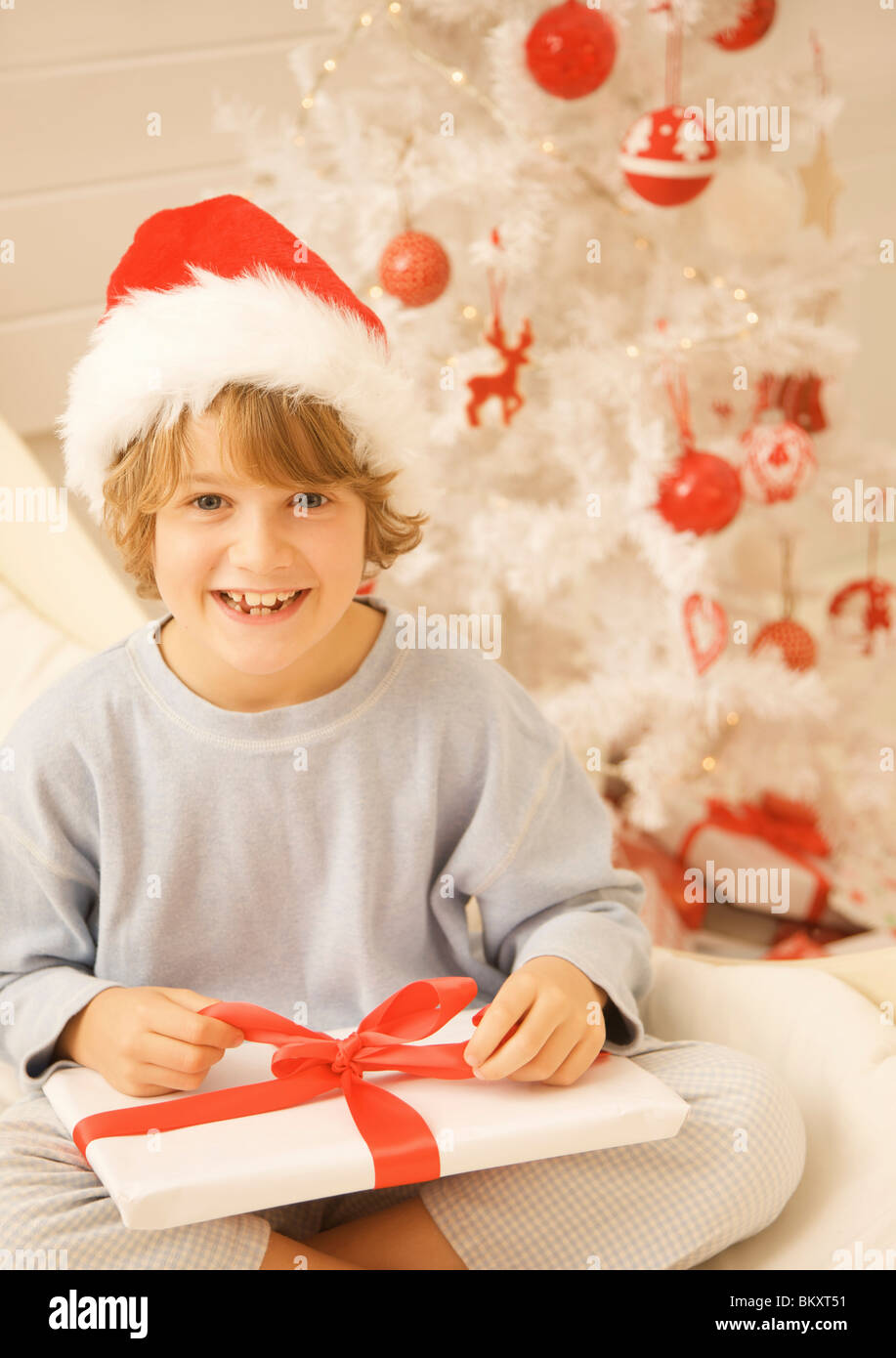 Father opening a xmas present hi-res stock photography and images - Alamy