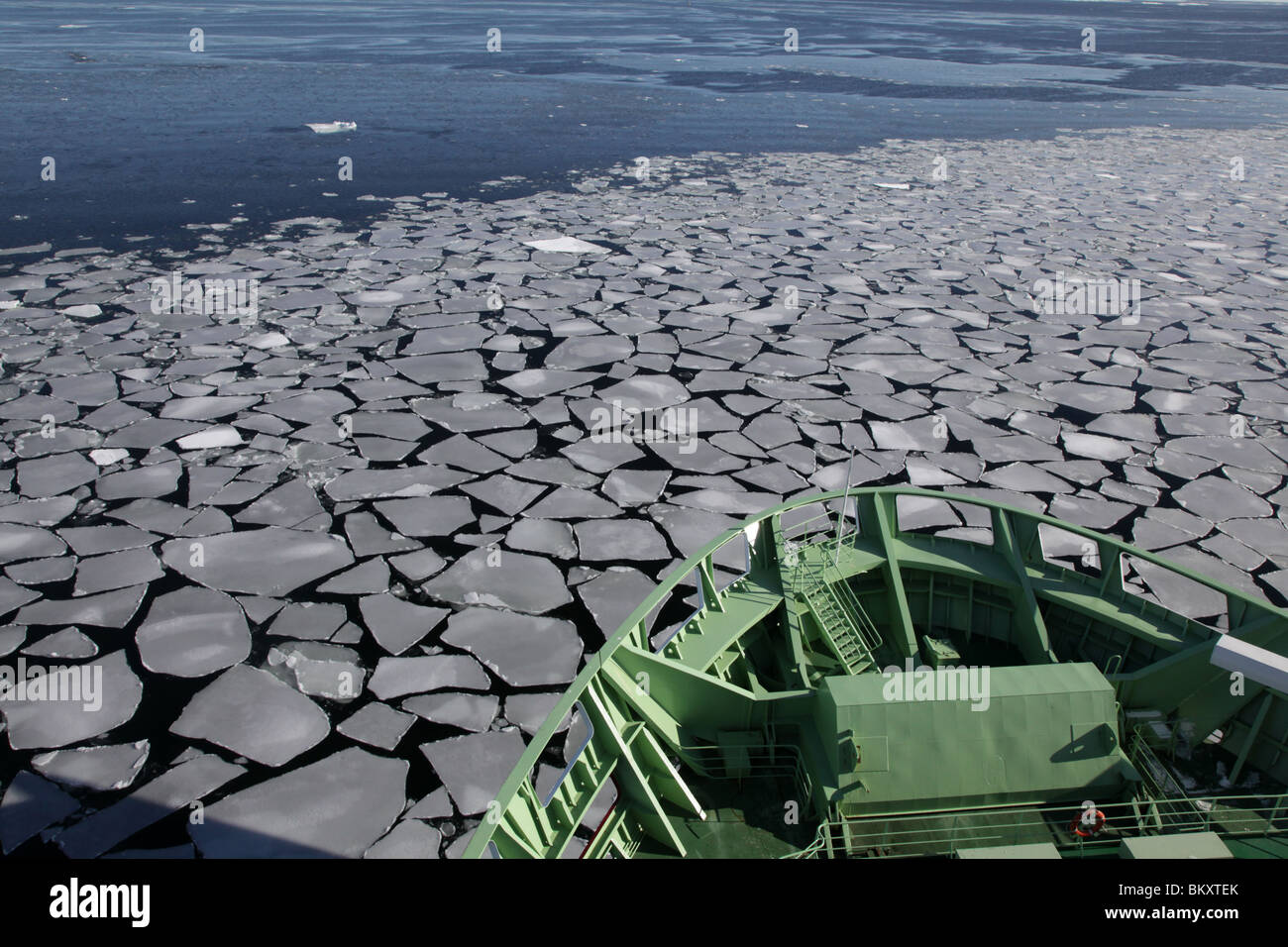 FERRY BOW DRAMATIC CROSSING SEA ICE BELT: Ferry boat ship cuts through ...
