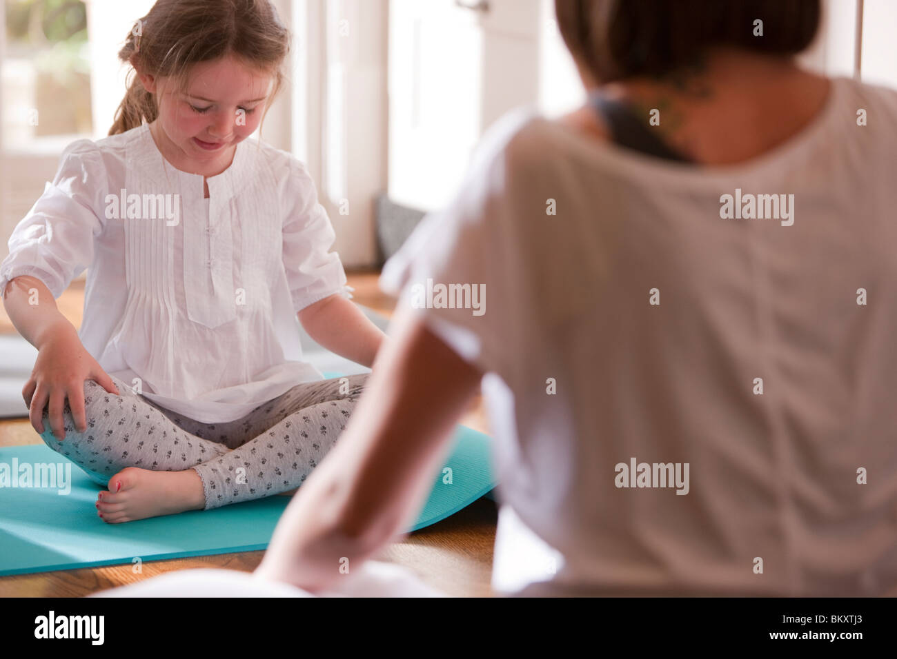 Crossed legs cross legged posture position hi-res stock photography and ...