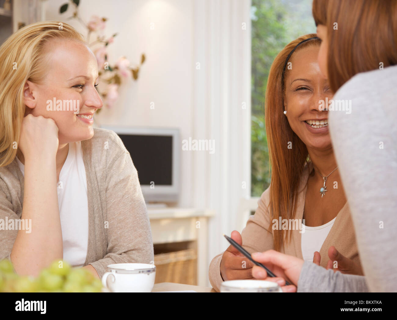 Woman drinking from bowl sitting hi-res stock photography and images ...