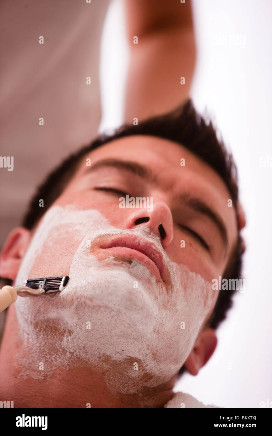 Close up of a man getting a shave Stock Photo - Alamy