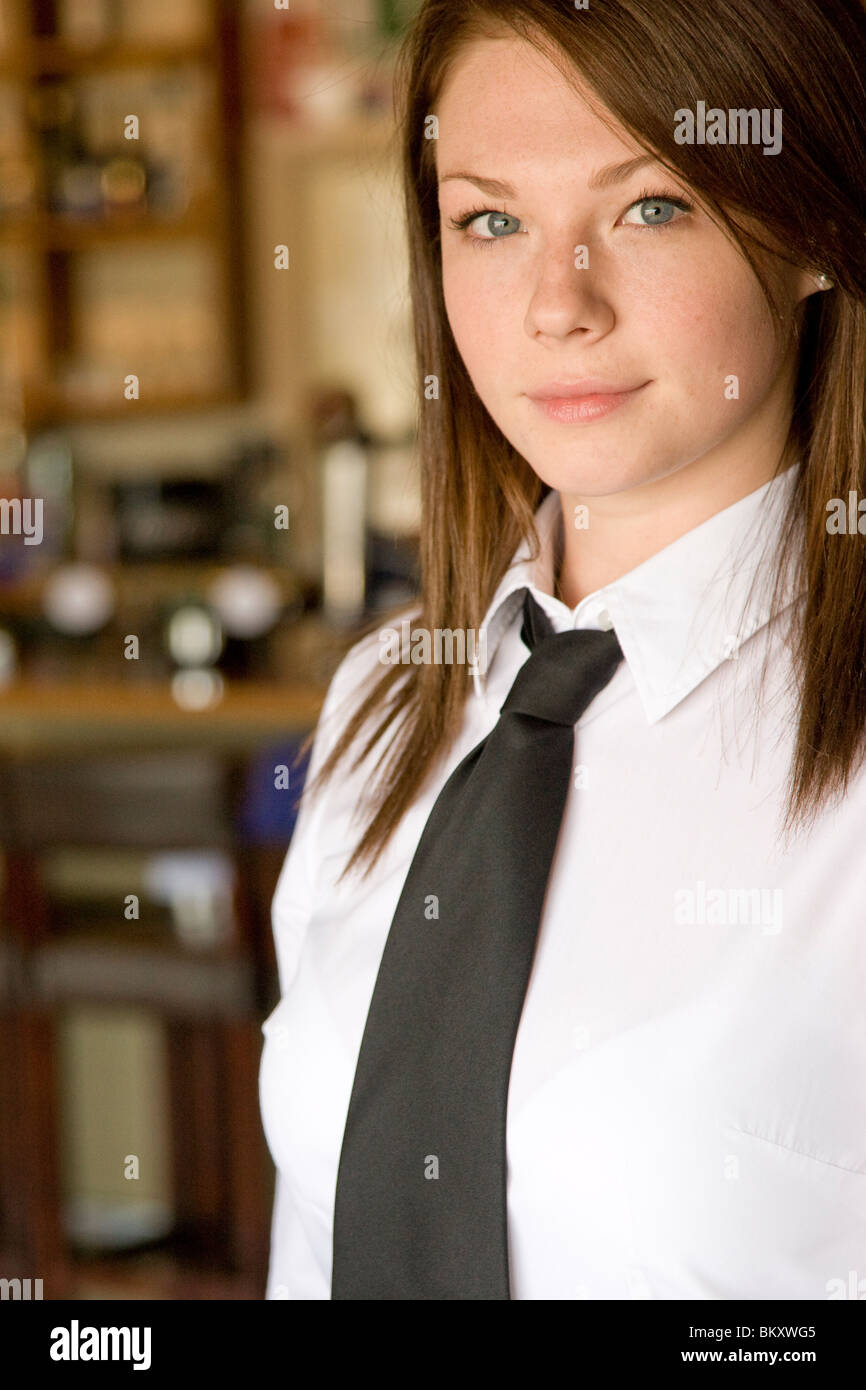 Portrait of a waitress Stock Photo - Alamy