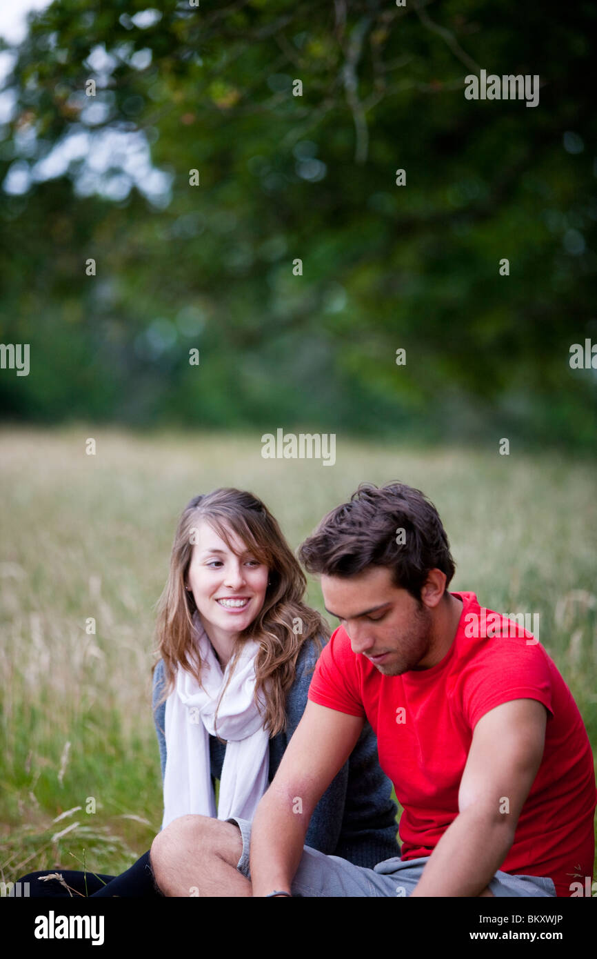 Two Men Sitting Under Tree High Resolution Stock Photography and Images ...