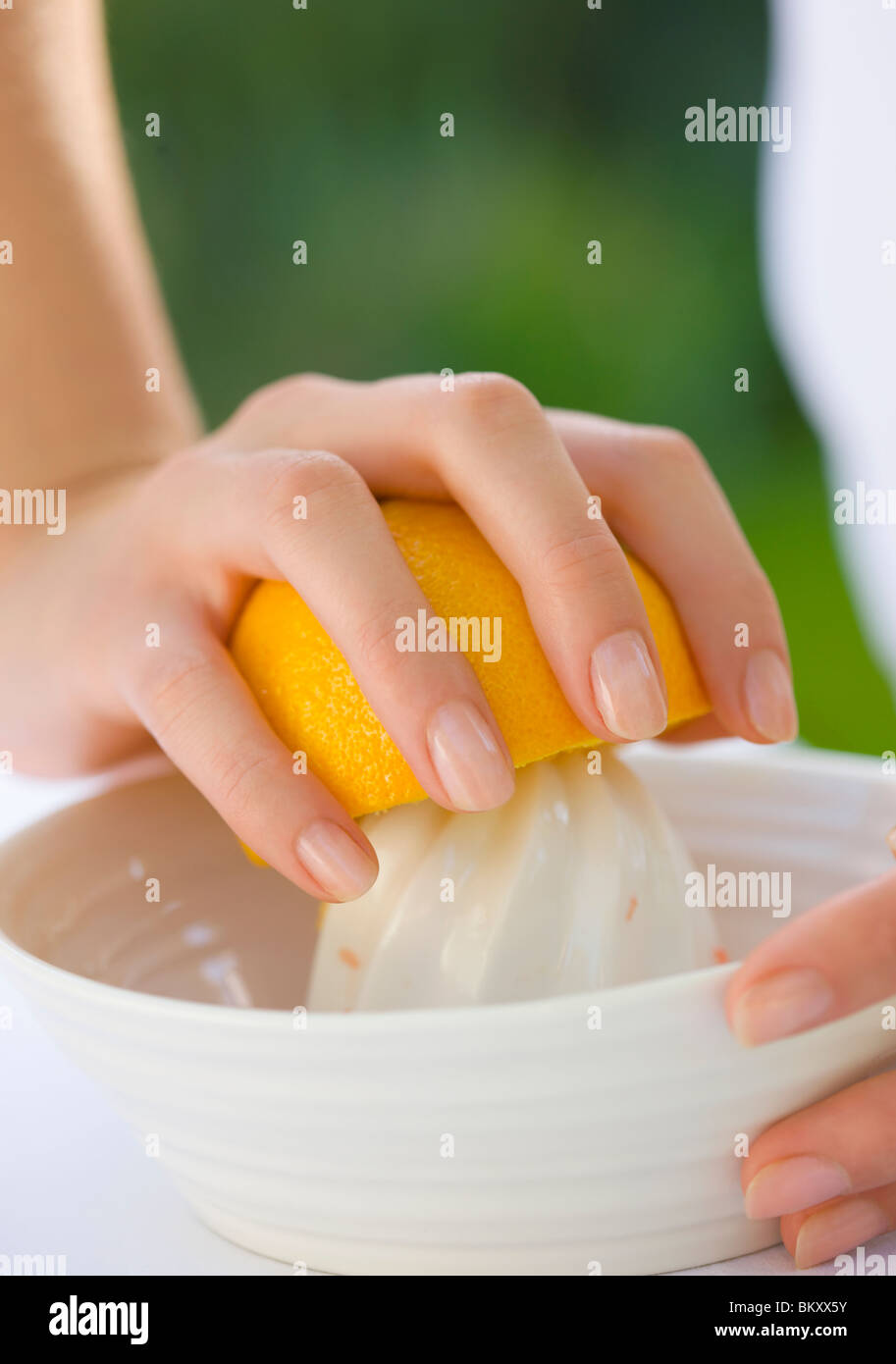 Hand Squeezing Orange Juice High Resolution Stock Photography and ...