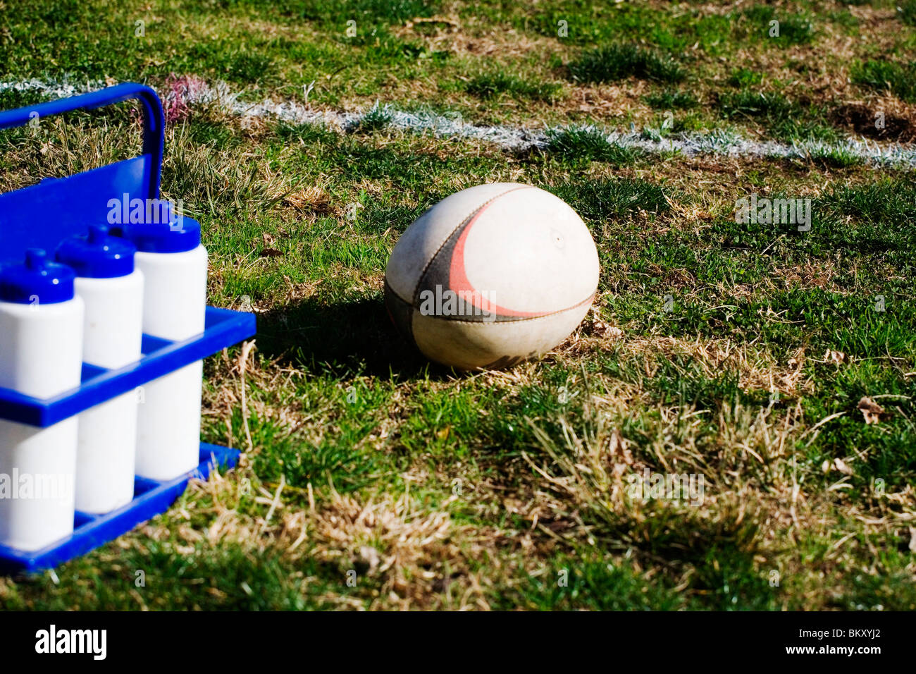 Rugby equipment on pitch with sideline in background Stock Photo - Alamy