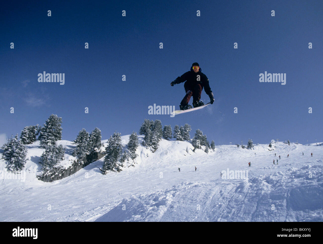 Snowboarder taking air hi-res stock photography and images - Alamy