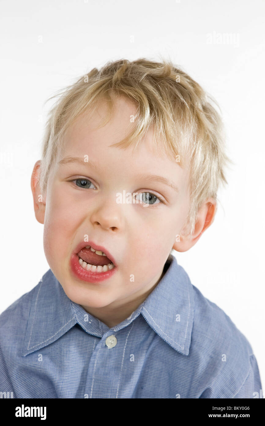 small boy making faces Stock Photo - Alamy