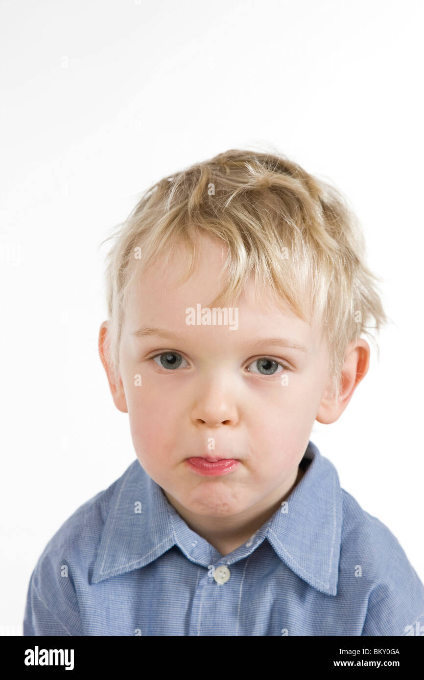 small boy making faces Stock Photo - Alamy